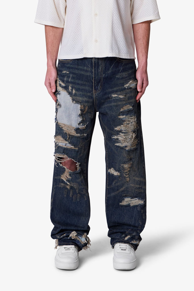 Ultra Baggy Gashed Denim - Blue | mnml | shop now