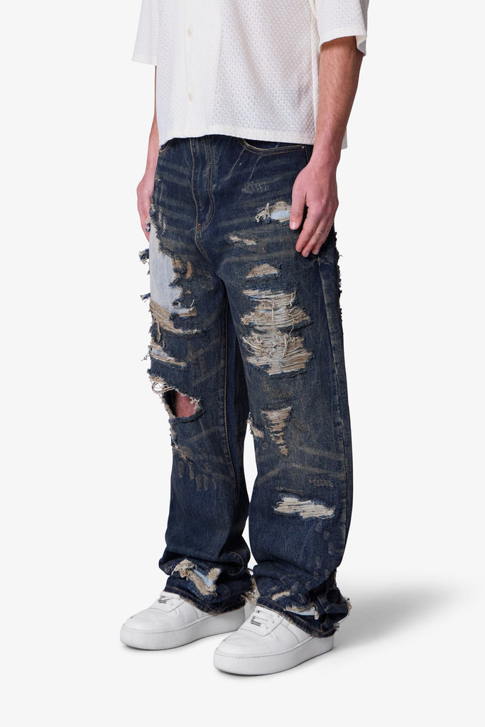 Ultra Baggy Gashed Denim - Blue | mnml | shop now
