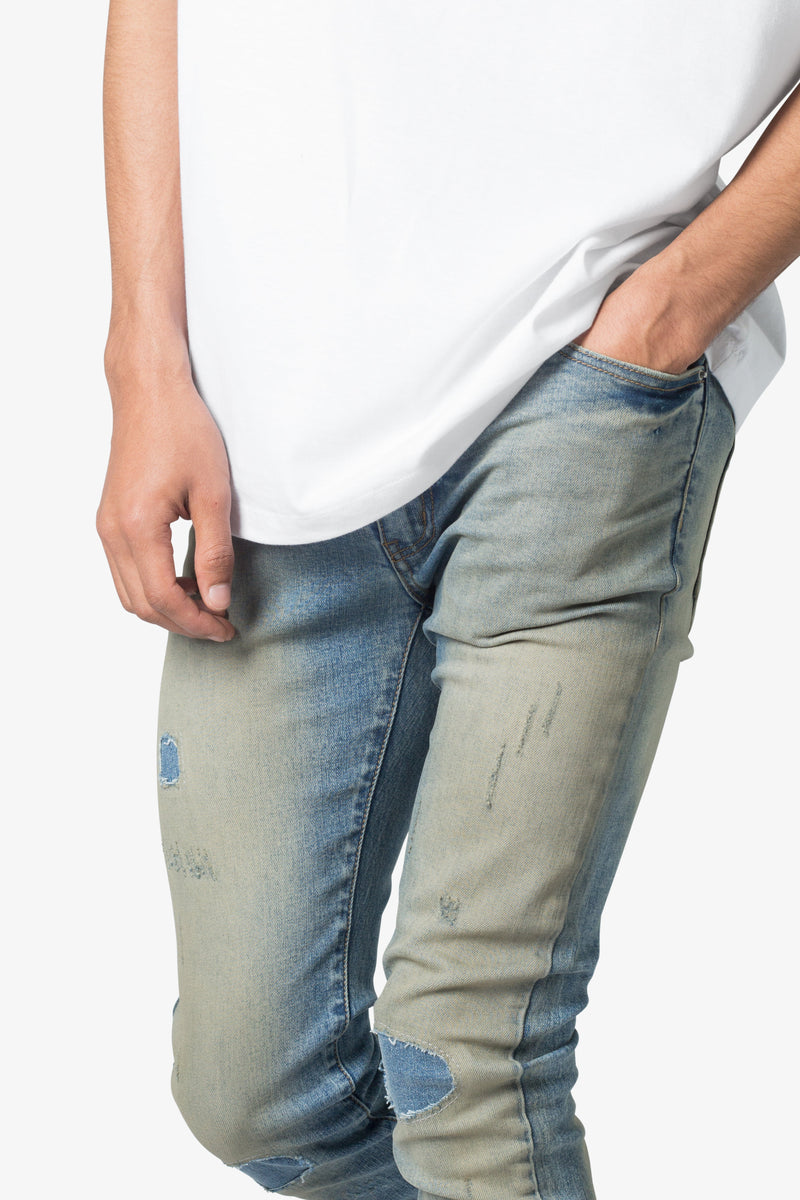 X651 Distressed Circle Knee Denim - Blue | mnml | shop now